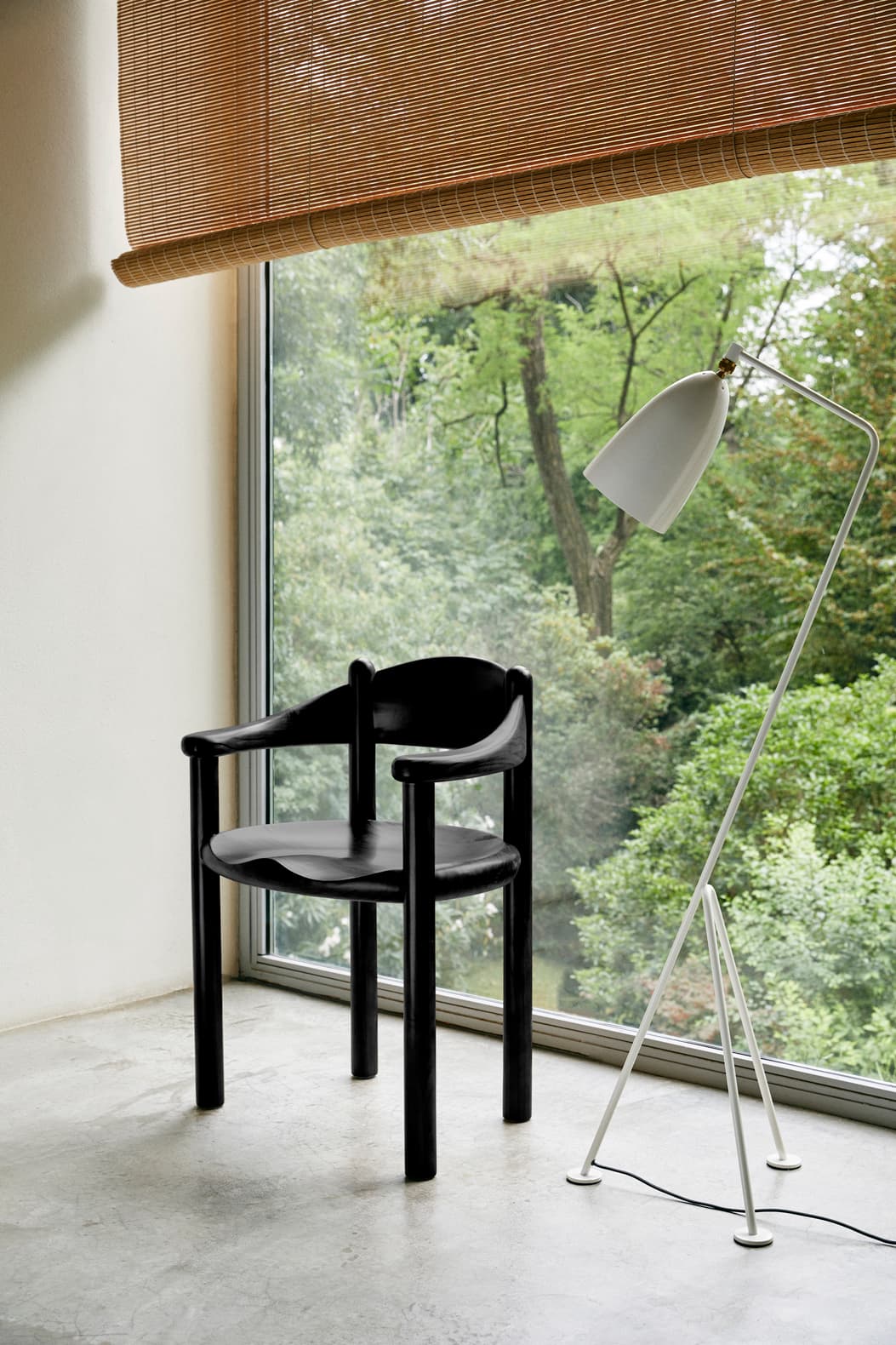 GUBI presents a new edition of the Daumiller Armchair in dark-stained ...